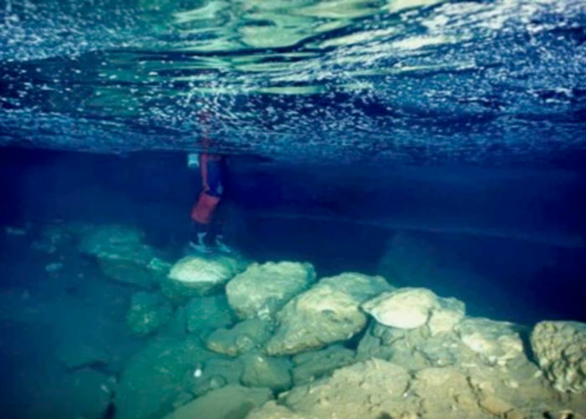 Discovery of submerged bridge built by ancient humans rewrites ...